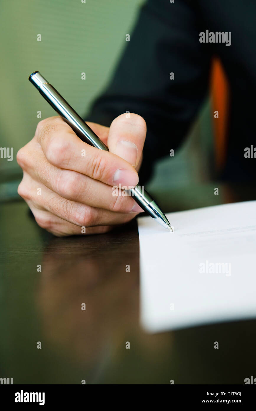 Person signing paperwork, cropped Stock Photo - Alamy