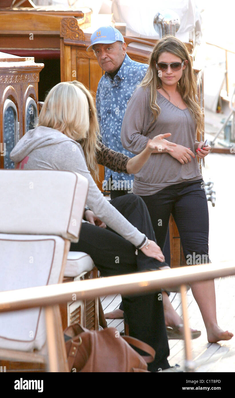 Mohamed Al-Fayed wearing a 'Harry and Sons' hat on his yacht, the ...