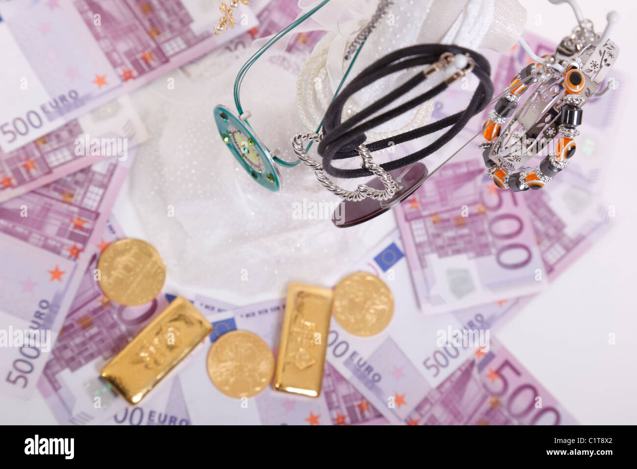 Euros (coins) and jewellery hi-res stock photography and images - Alamy