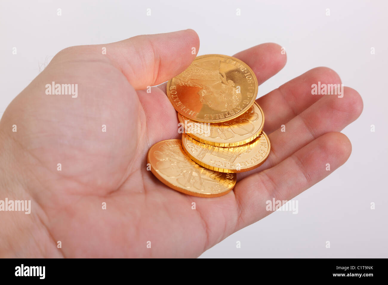 Hand hold gold bars hi-res stock photography and images - Alamy