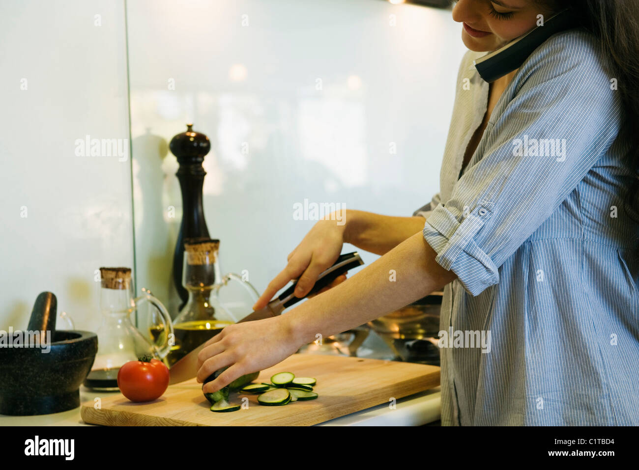 Talking on phone tomato hi-res stock photography and images - Alamy