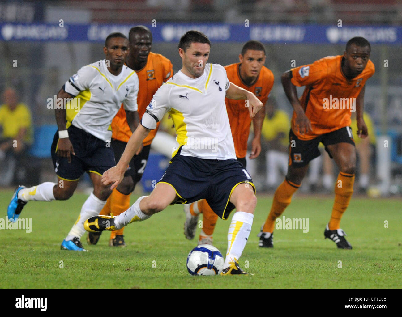 Tottenham hotspur robbie keane scores hi-res stock photography and ...