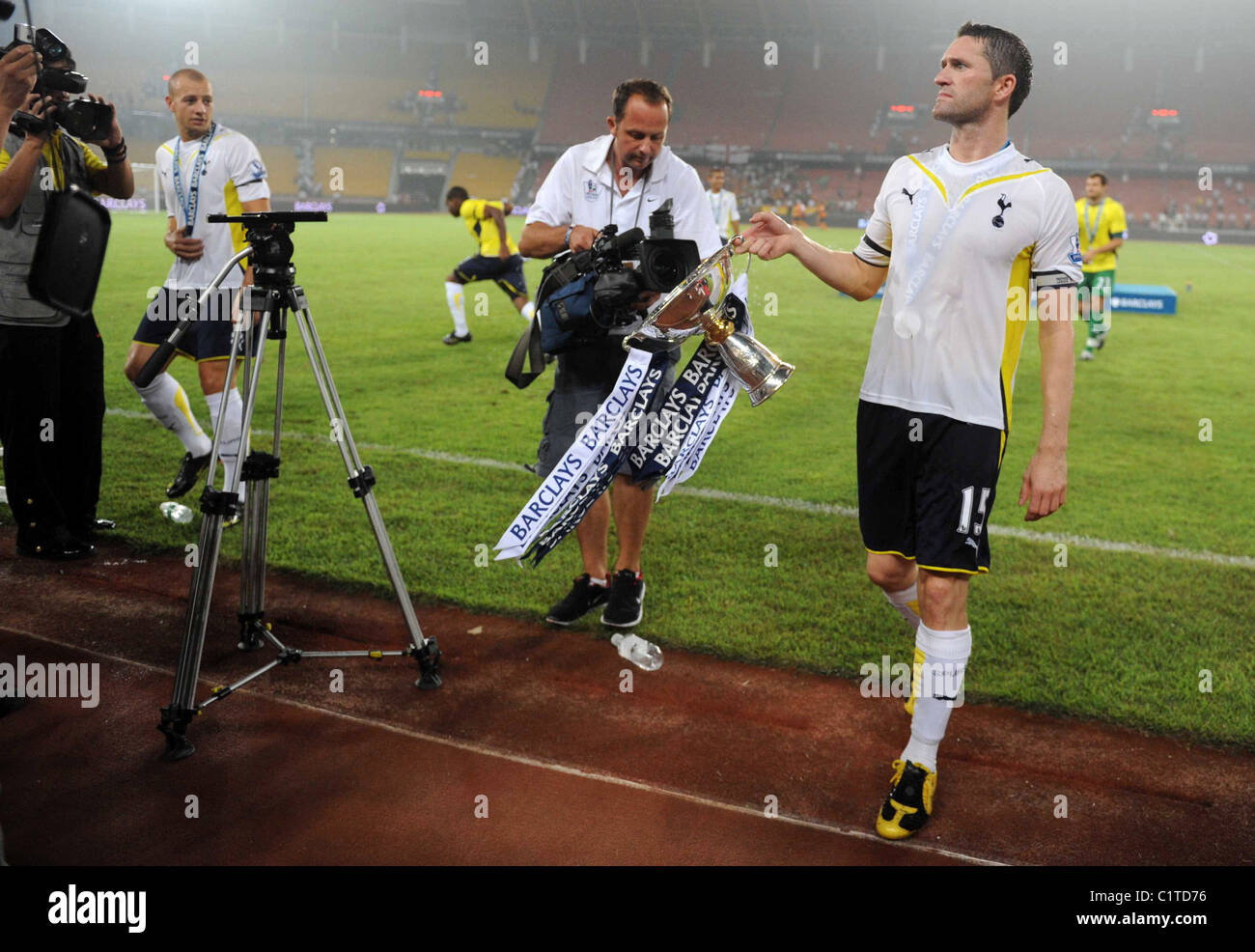 Tottenham Hotspur`s Robbie Keane with the trophy Barclays Asia Trophy ...