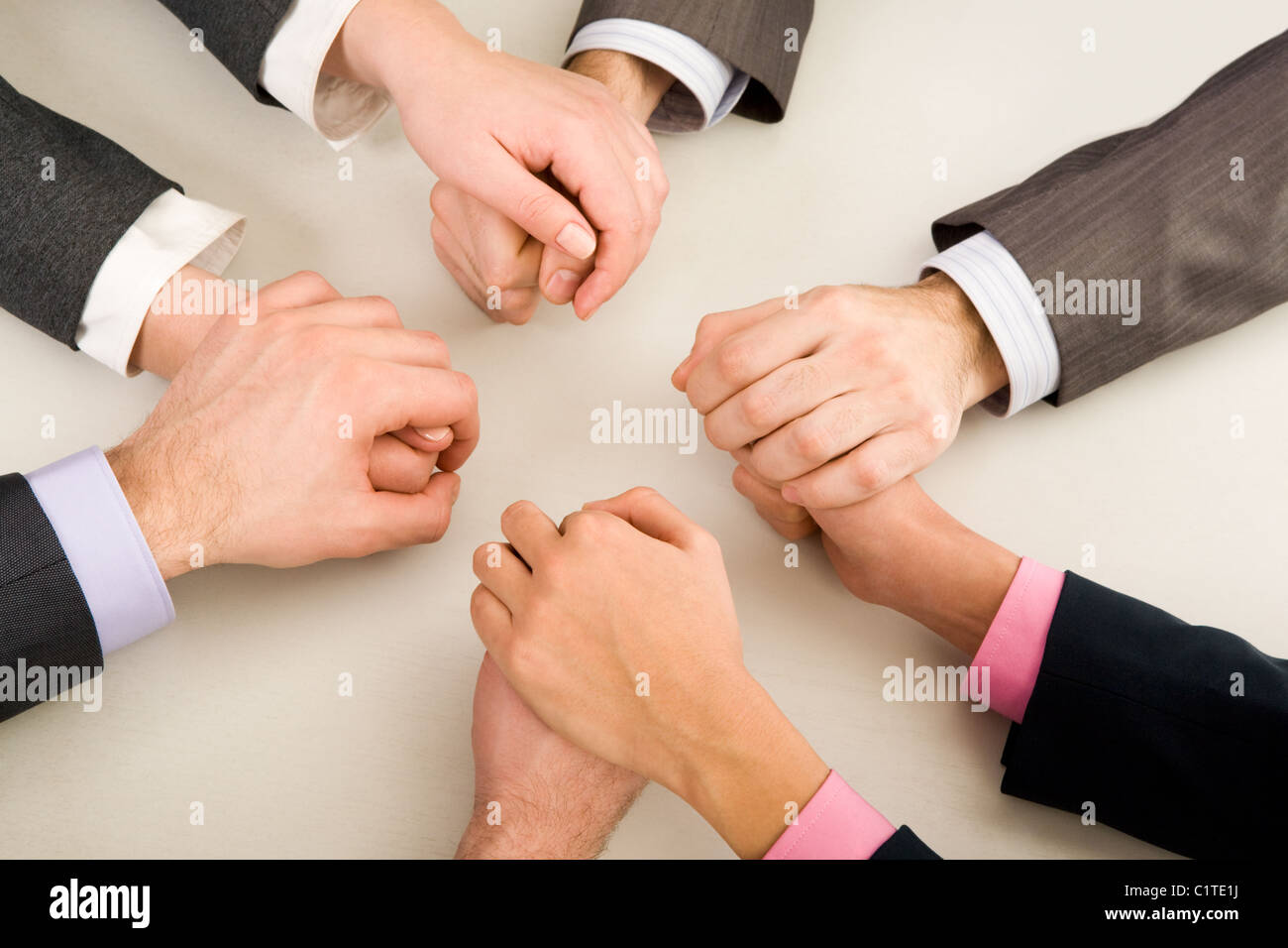 Image of business partners hands holding each other Stock Photo - Alamy