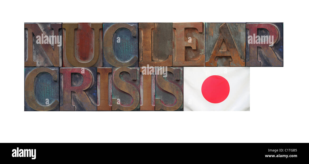 the words nuclear crisis with a Japanese flag Stock Photo - Alamy