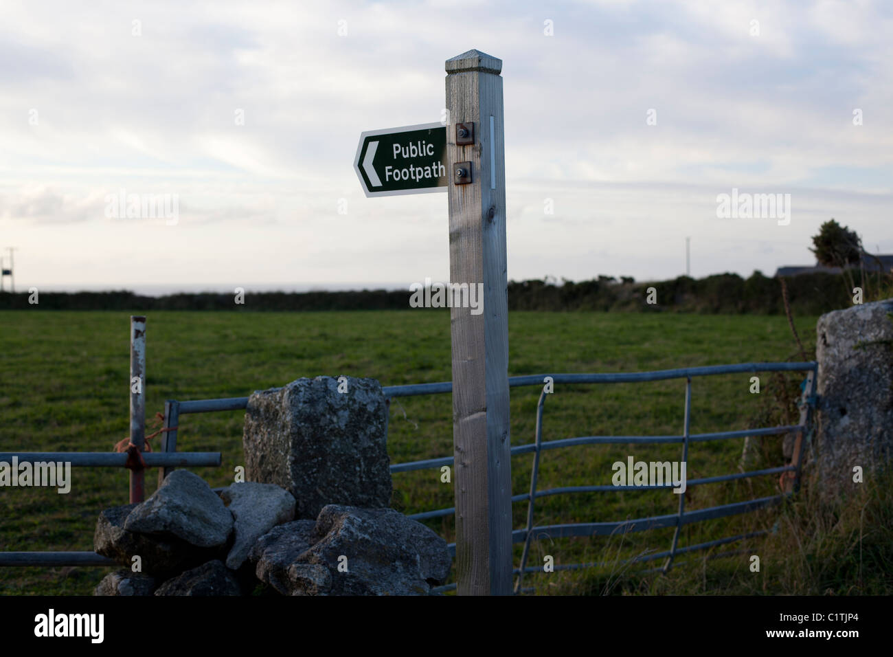 Public footpath sign in English countryside Stock Photo - Alamy