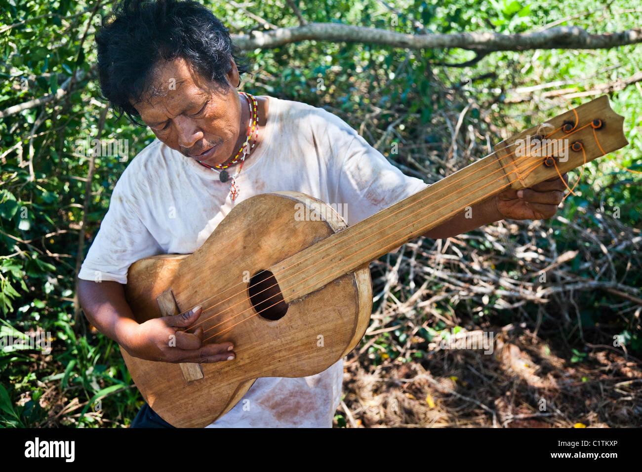 Indigenous guitar hi-res stock photography and images - Alamy