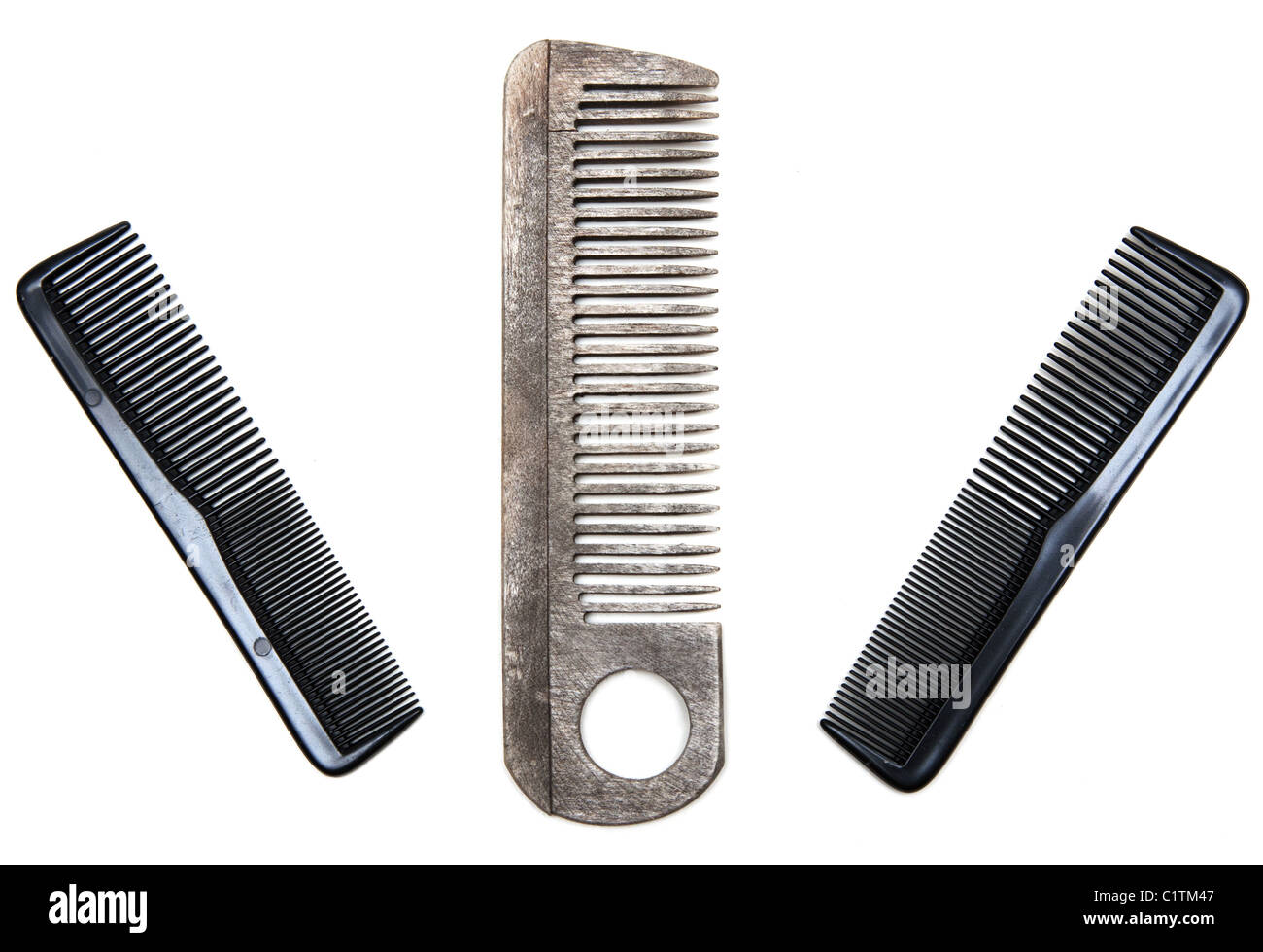 Three plastic combs insulated on white background Stock Photo - Alamy