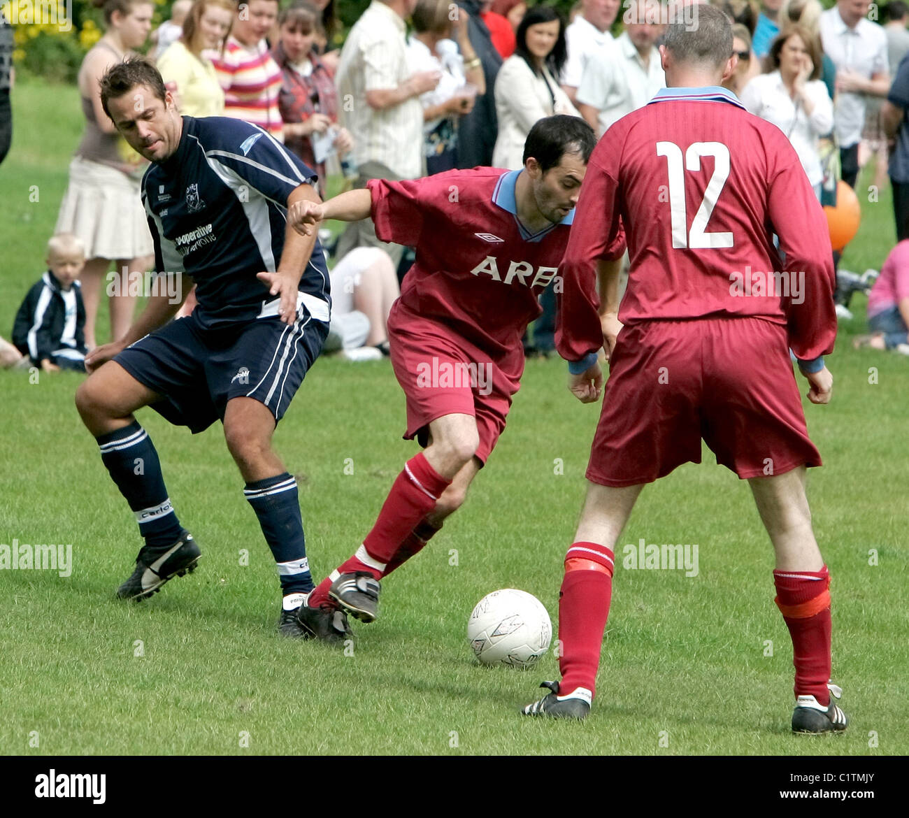 Jamie Lomas of Hollyoaks (right), playing at a charity football match ...
