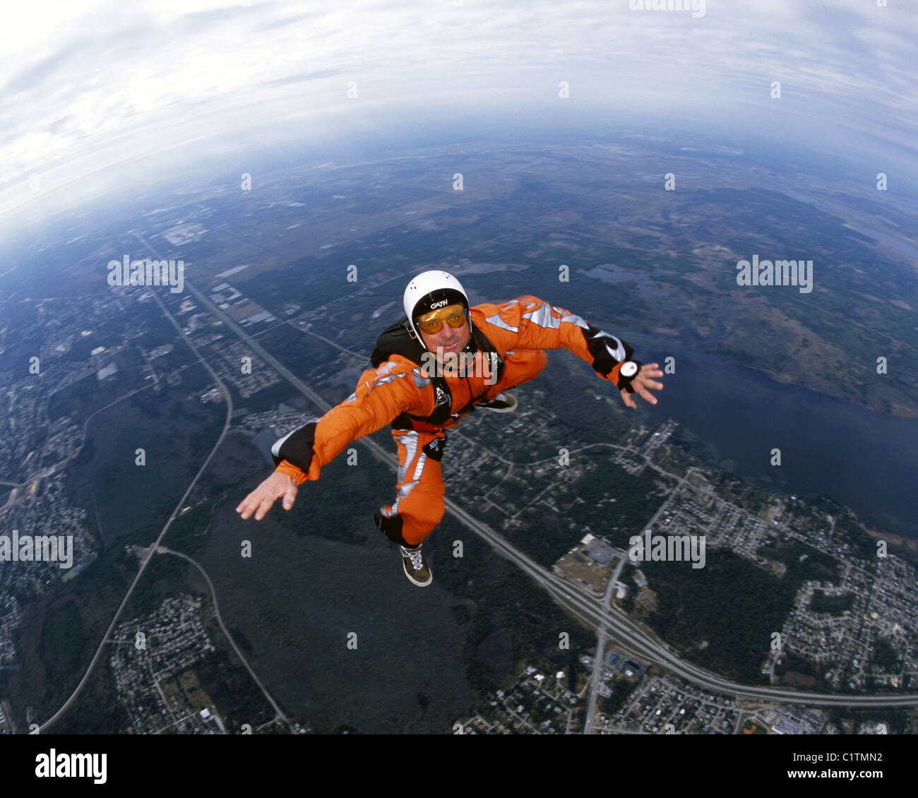 Mid adult man skydiving Stock Photo - Alamy