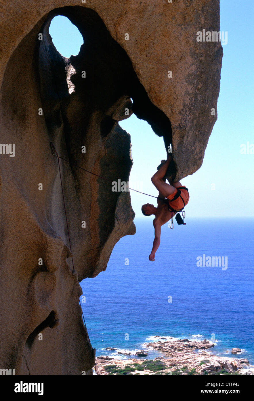 Man hanging upside down by a rope hi-res stock photography and images ...