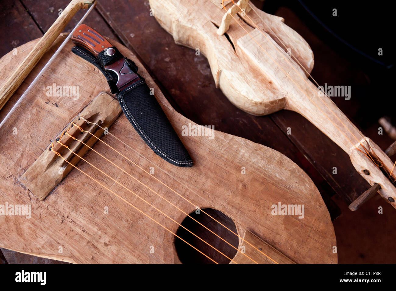 Hand made mbya guarani indigenous guitar hi-res stock photography and ...