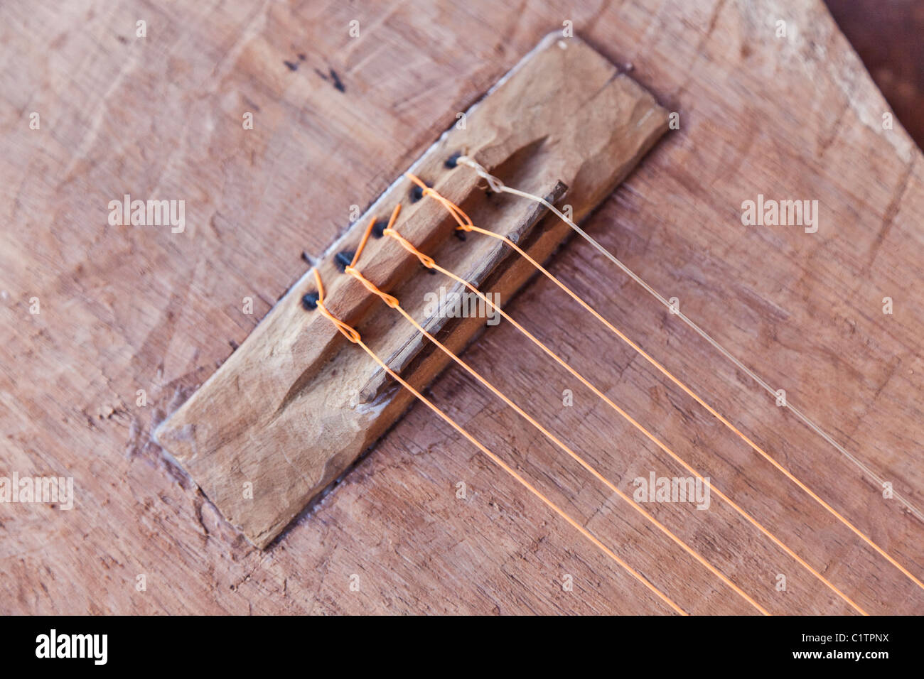 Hand made mbya guarani indigenous guitar hi-res stock photography and ...