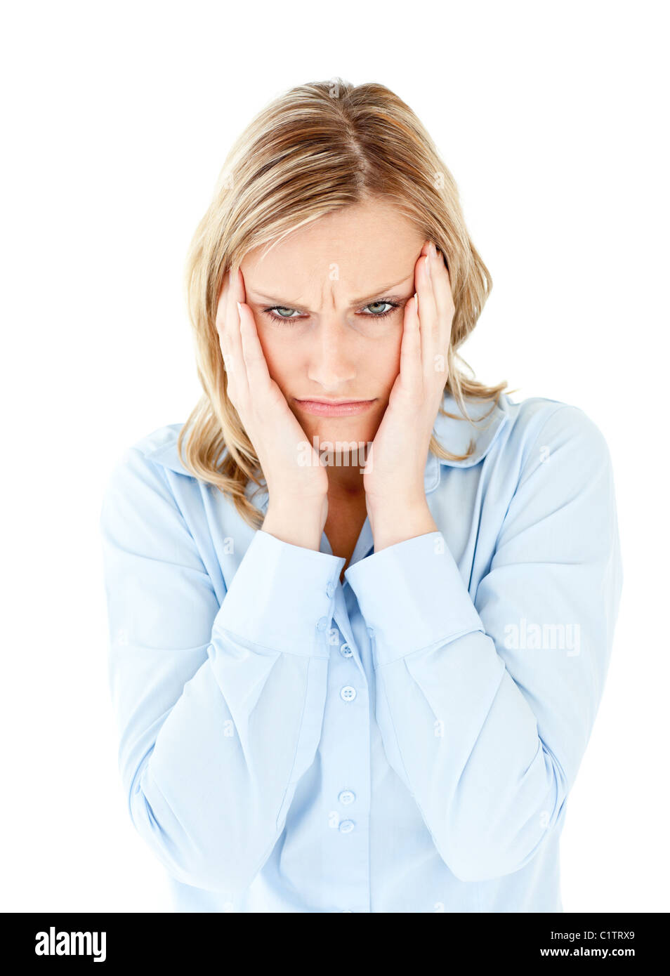 Downcast businesswoman taking her head between her hands Stock Photo ...