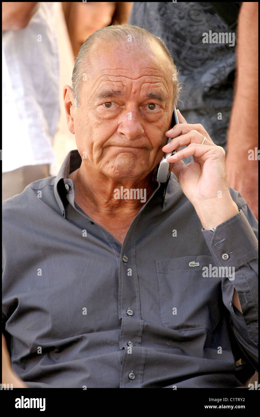 Former French president Jacques Chirac visits a market with friends ...