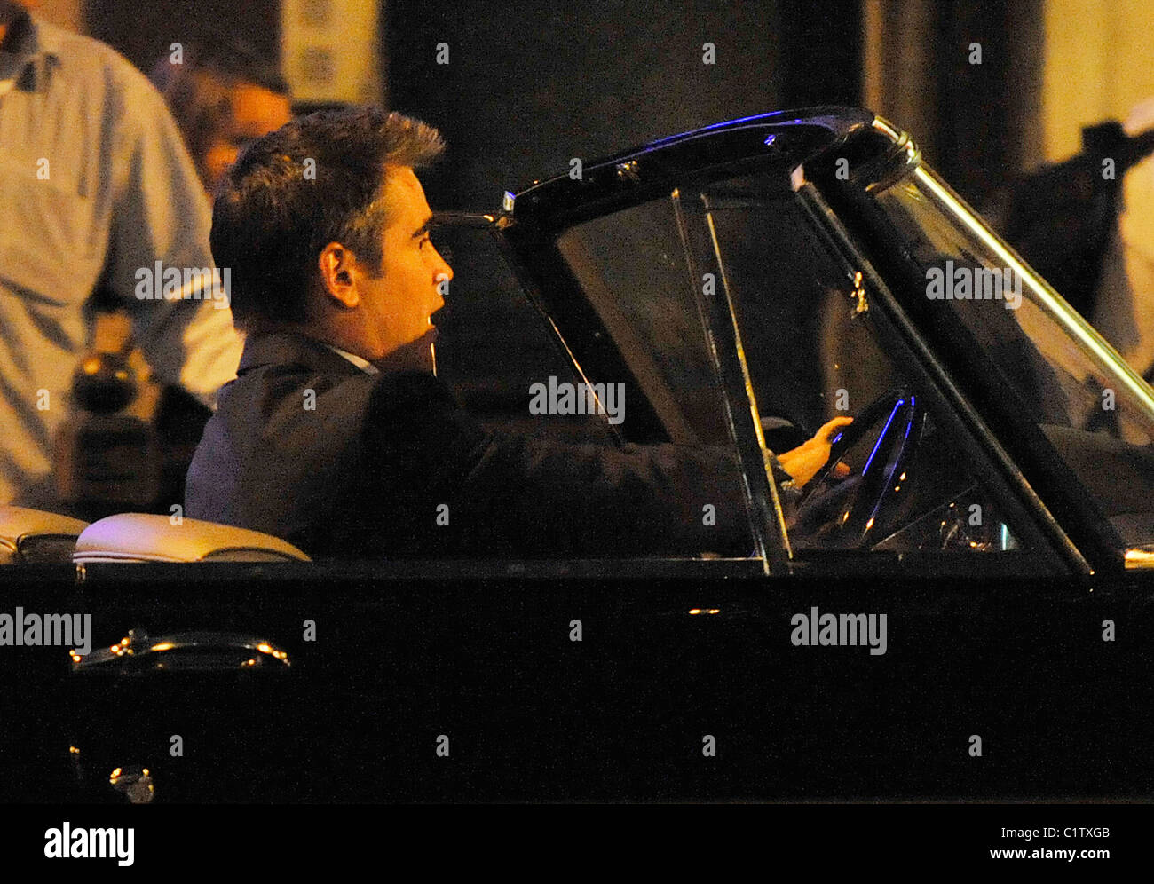 Colin Farrell driving a Rolls Royce on the film set of his latest movie ...