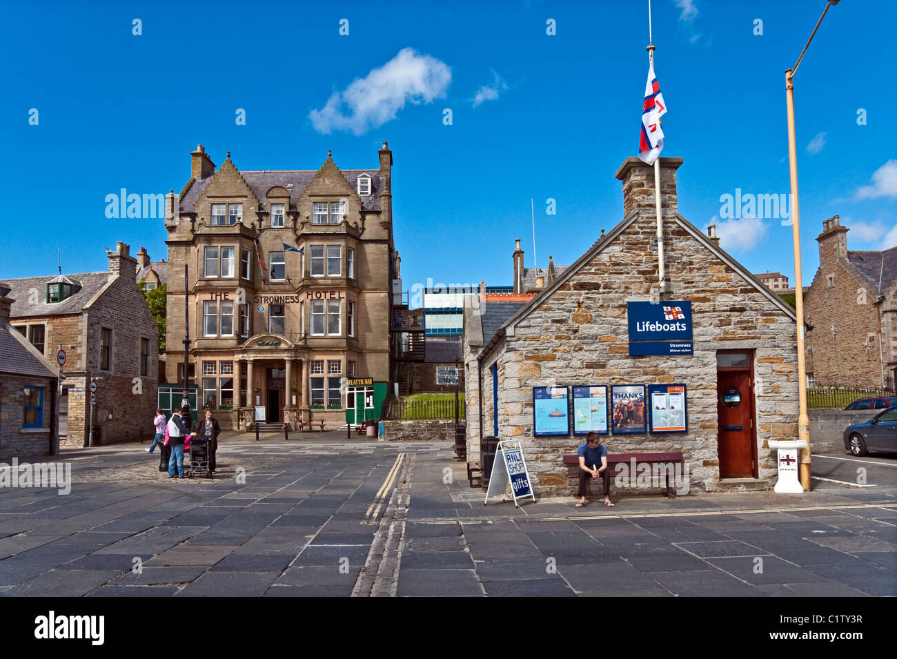 Stromness harbour area with lifeboats office and The Stromness Hotel on ...