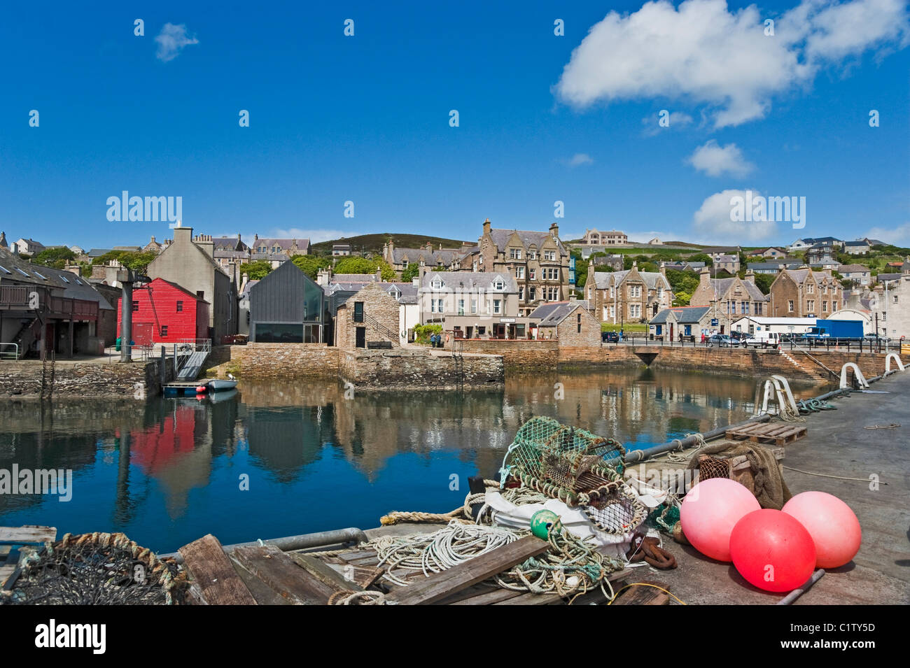 Fishing equipment on the pier in Stromness Harbour on the Orkney ...