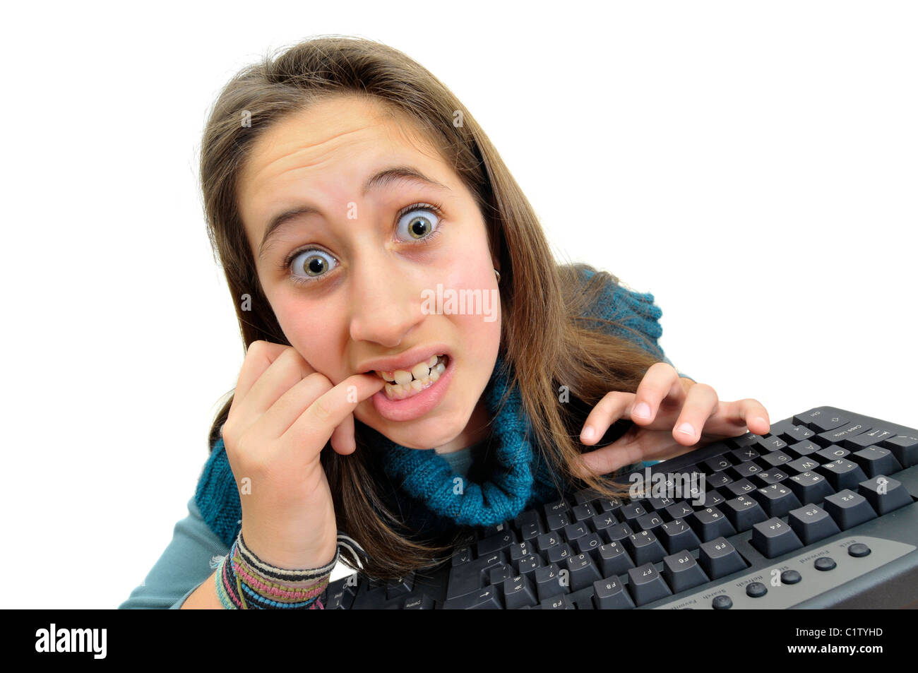 Stressed young girl in front of a computer screen Stock Photo - Alamy