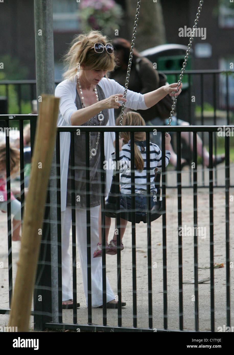 Kate Garraway taking her children Darcy and William to the park London ...