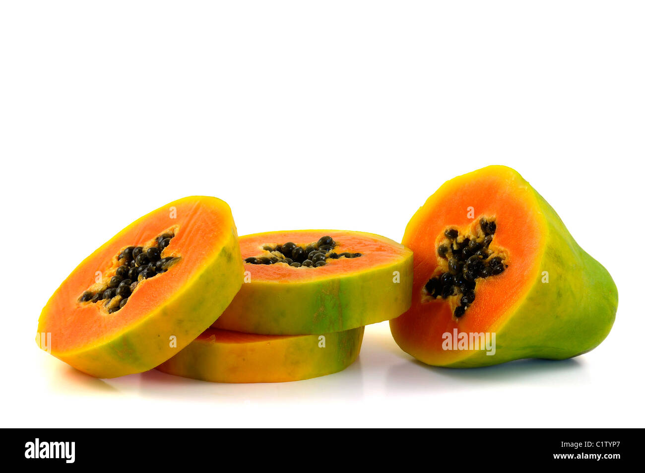 Papaya fruit isolated in white Stock Photo - Alamy