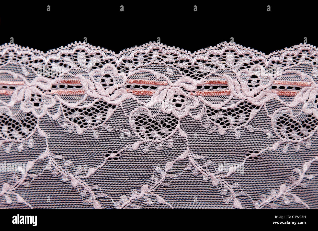 Rose lace with pattern in form flower insulated on black background ...
