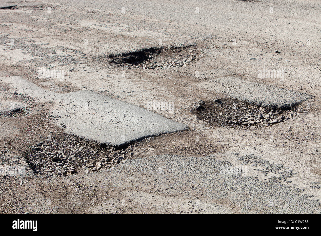 A very badly potholed section of road at Troutbeck Bridge in South ...
