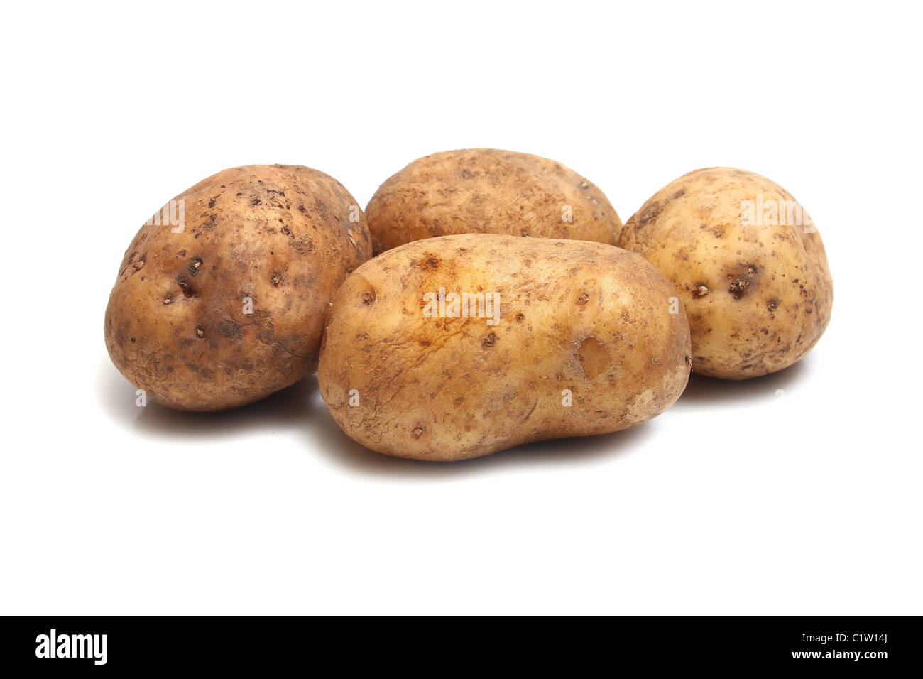 raw brown potato isolated on white background Stock Photo - Alamy