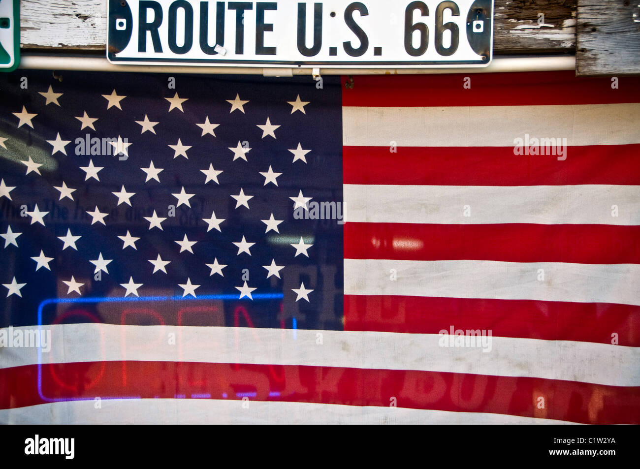 Close-up of an American flag with road sign, Route 66, USA Stock Photo ...