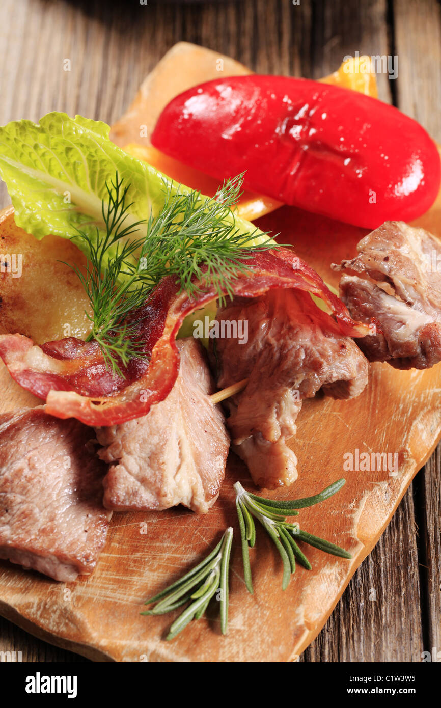 Shish kebab and rasher of crispy bacon Stock Photo - Alamy