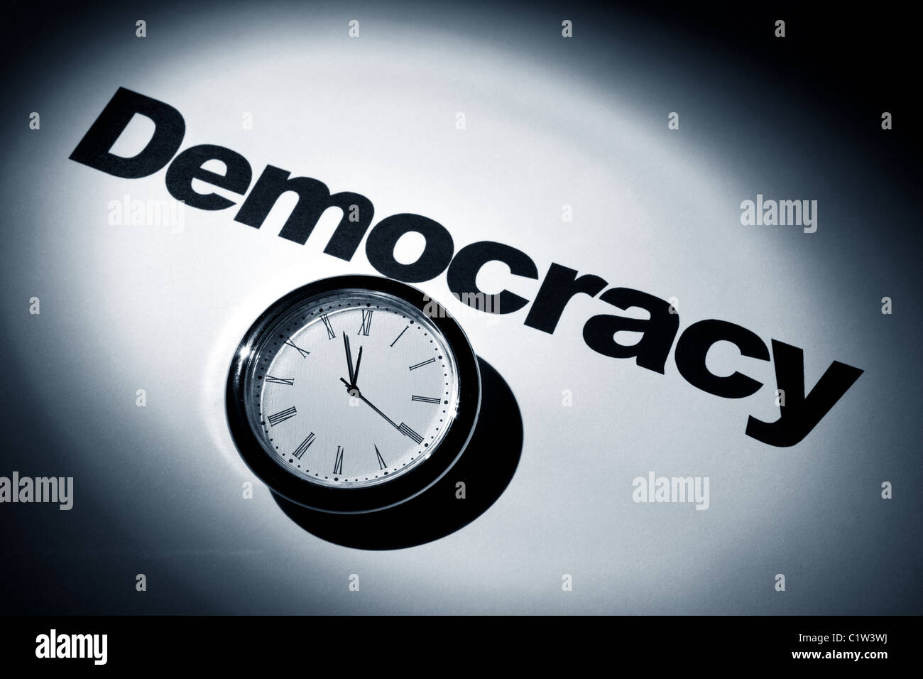 Clock and word of Democracy for background Stock Photo - Alamy