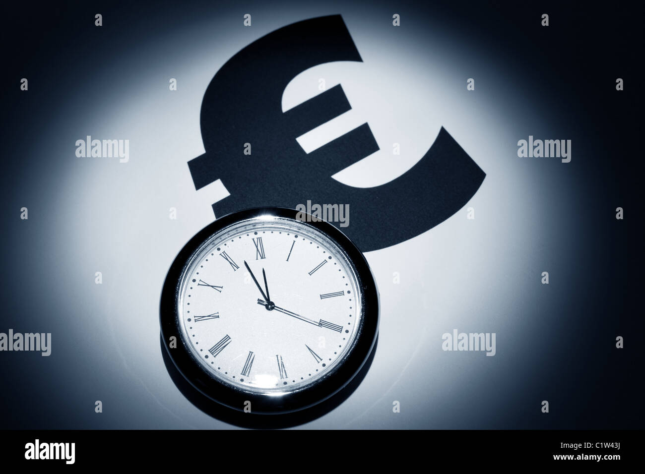 Clock and Euro Symbol for background Stock Photo - Alamy