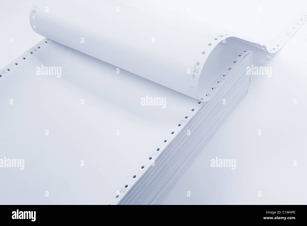 Perforated Computer Paper for background Stock Photo - Alamy