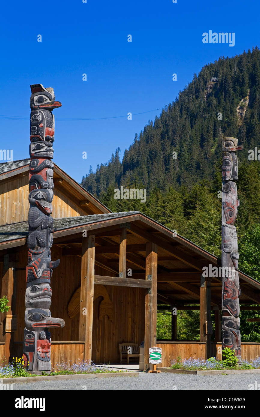 Totem poles in front of a museum, Icy Strait Point, Hoonah City ...