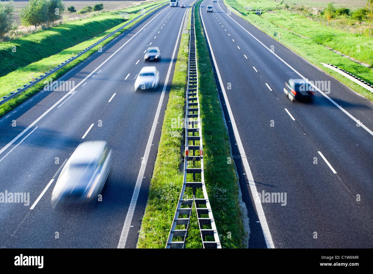 Blurred cars on highway traffic Stock Photo - Alamy