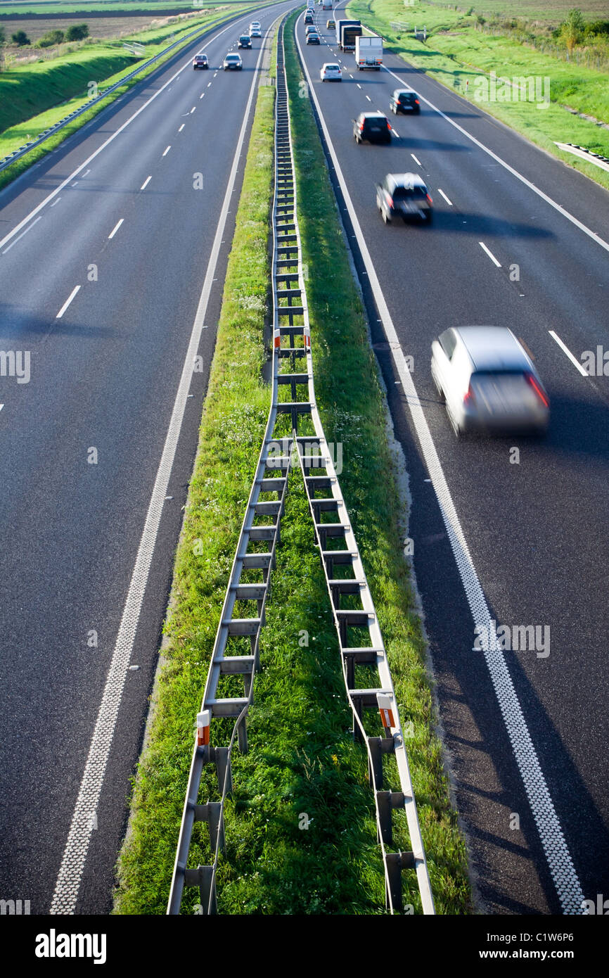Blurred cars on highway traffic in summer Stock Photo - Alamy