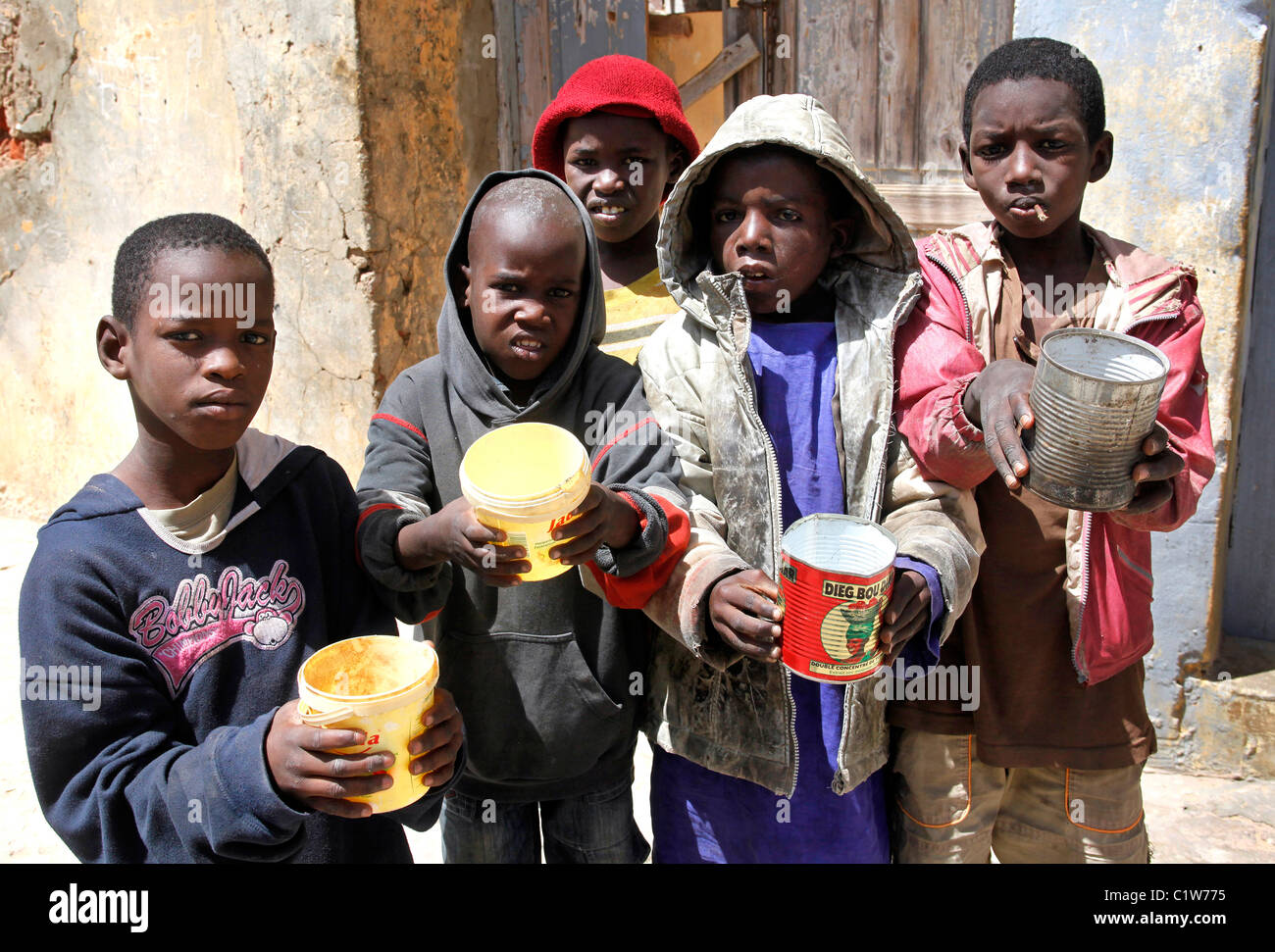 Young Talibé (students from a koranic school) beg on the streets of ...