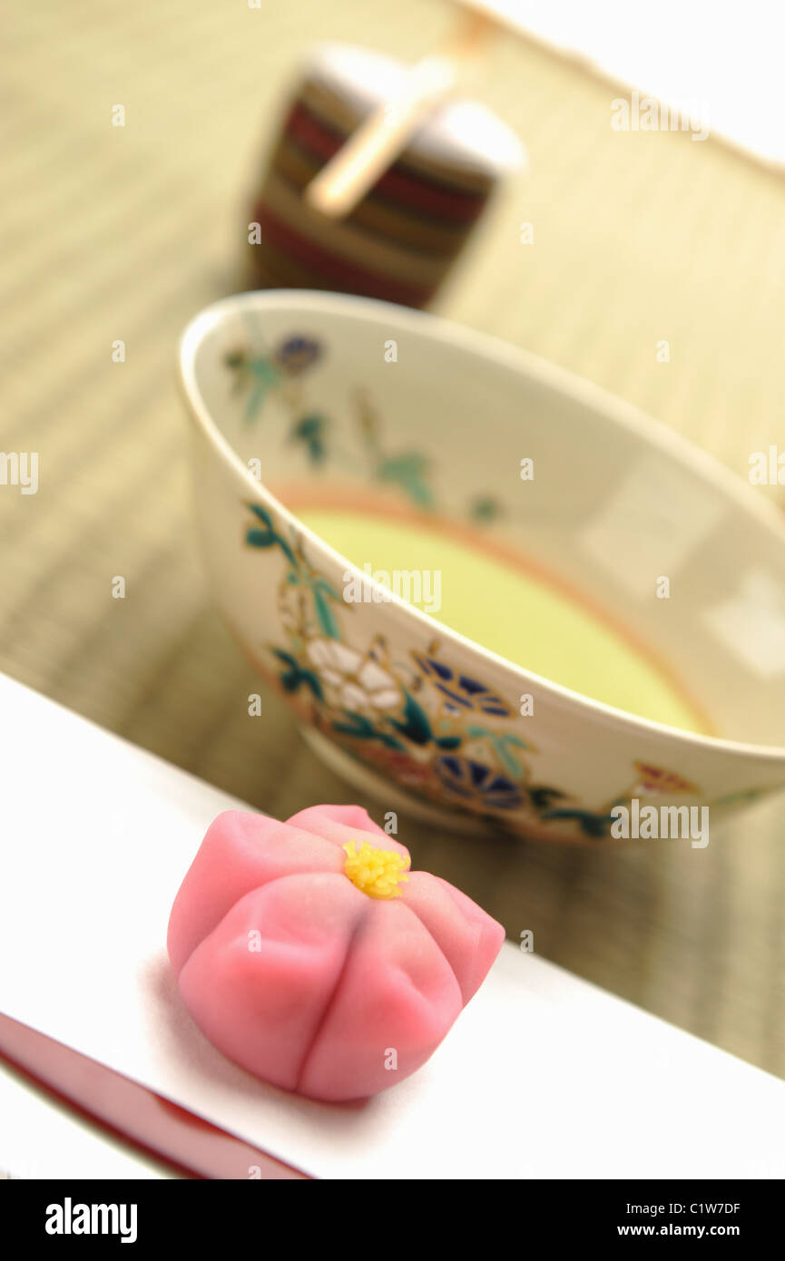 Maccha tea served with a teacake in tea ceremony Stock Photo - Alamy