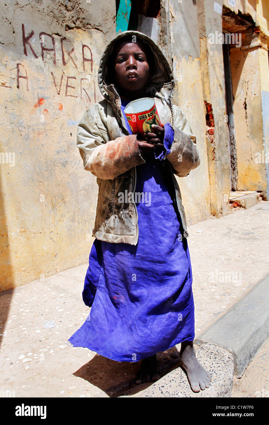 Young Talibé (students from a koranic school) beg on the streets of ...