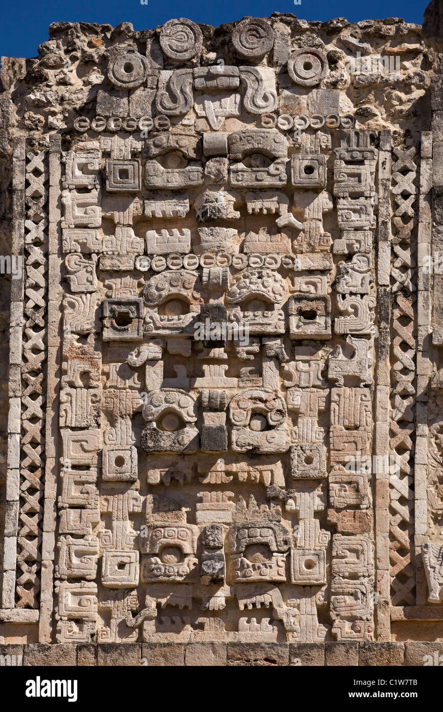 Intricate facade of Chac masks in the Nunnery Quadrangle in the Puuc ...