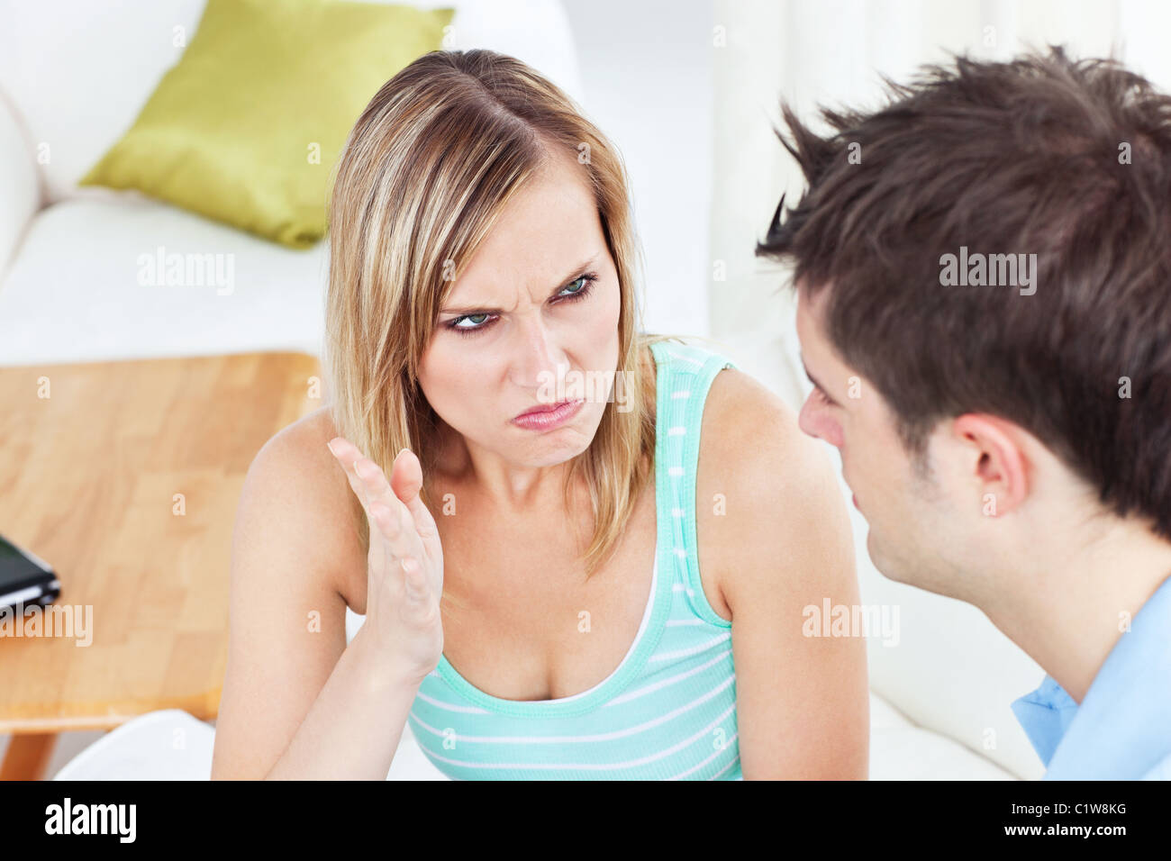 Young couple arguing in ther living-room Stock Photo - Alamy
