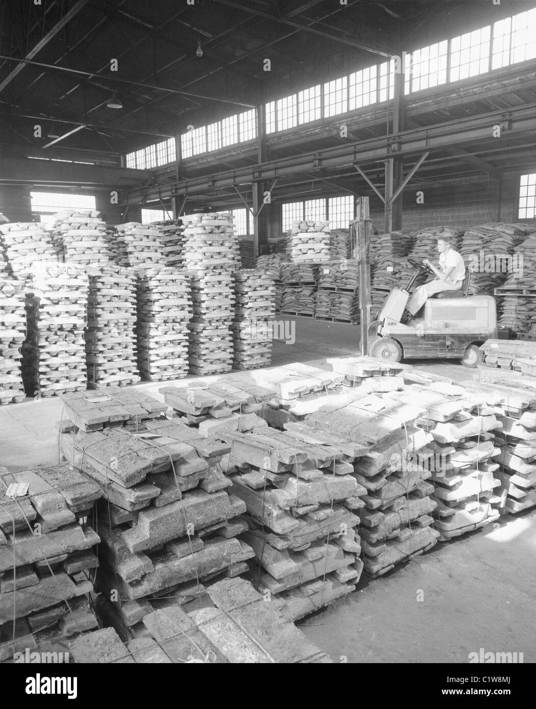 Man working in large Black and White Stock Photos & Images - Alamy