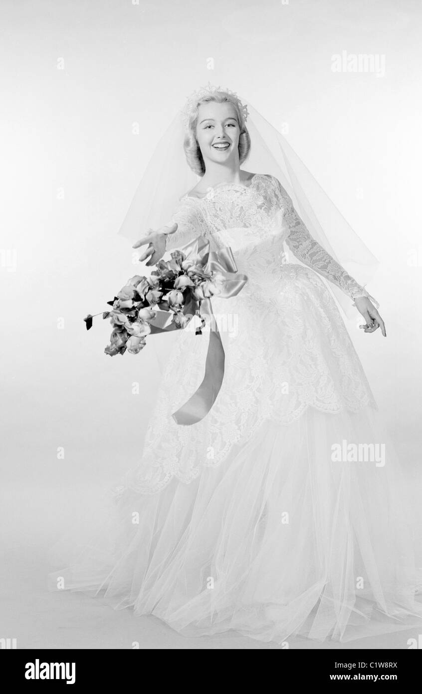 Bride holding wedding veil Black and White Stock Photos & Images - Alamy