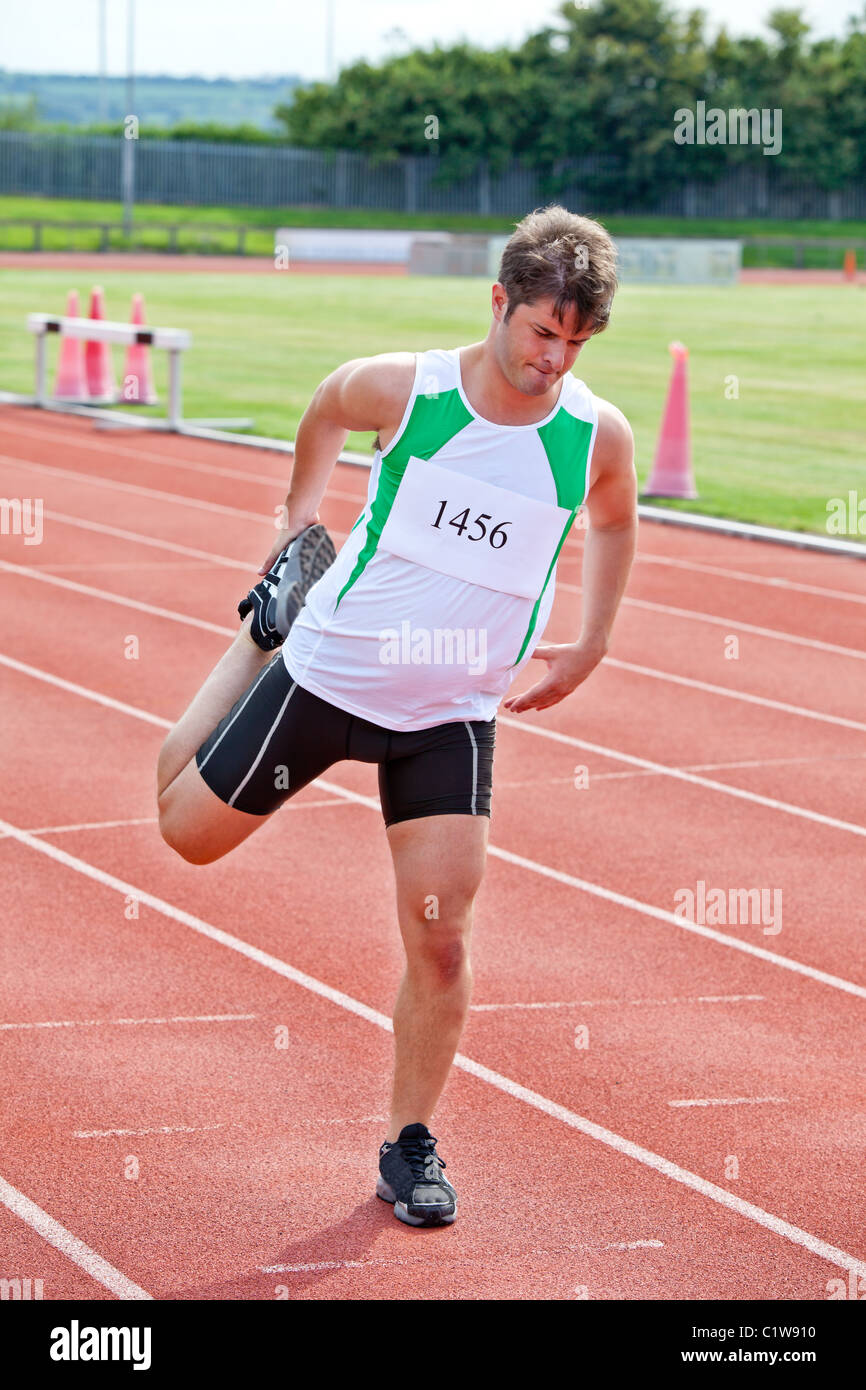 Sprinter stretching hi-res stock photography and images - Alamy