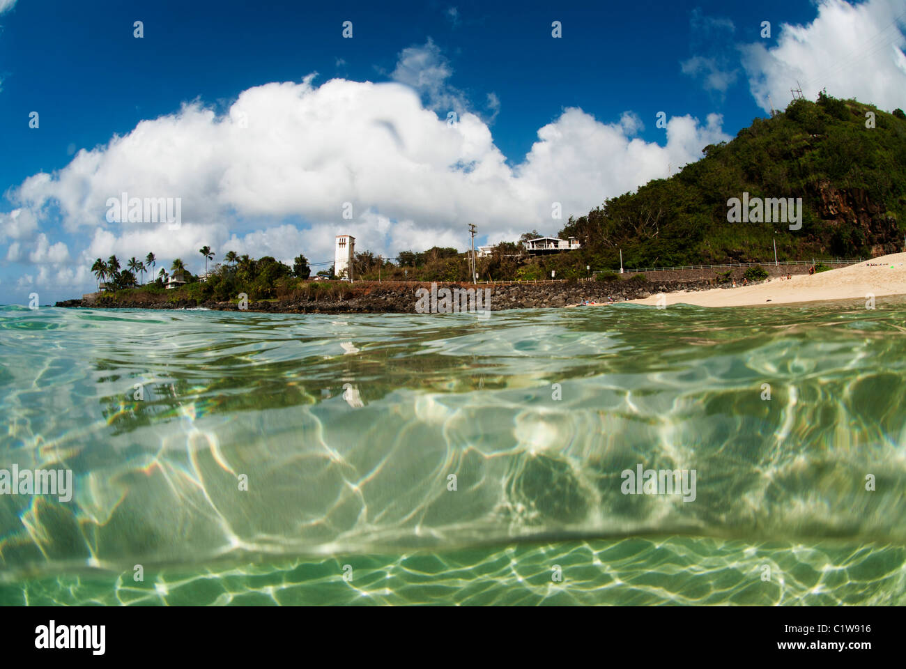 A wide angle shot taken in the water half in and half out of the water ...