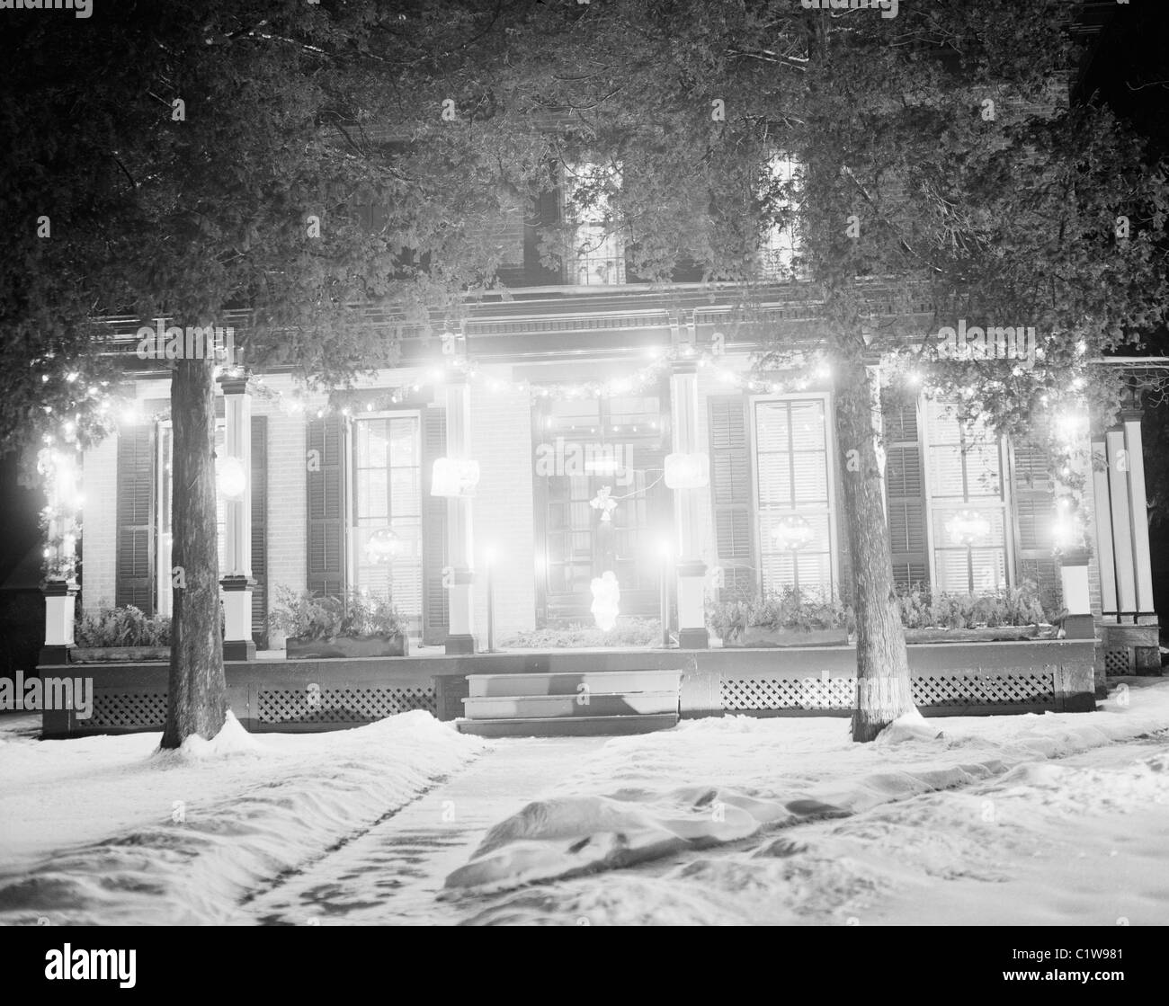 Christmas house on snow Black and White Stock Photos & Images - Alamy