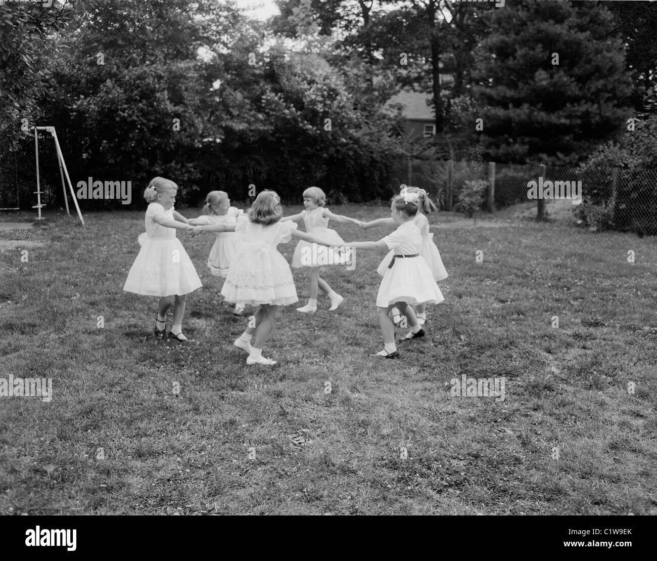 Group girls in white Black and White Stock Photos & Images - Alamy