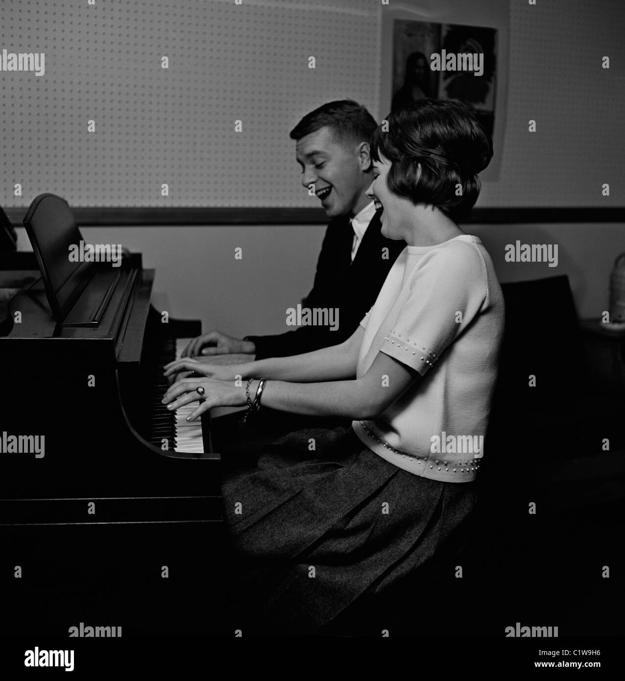 Youngsters playing piano hi-res stock photography and images - Alamy