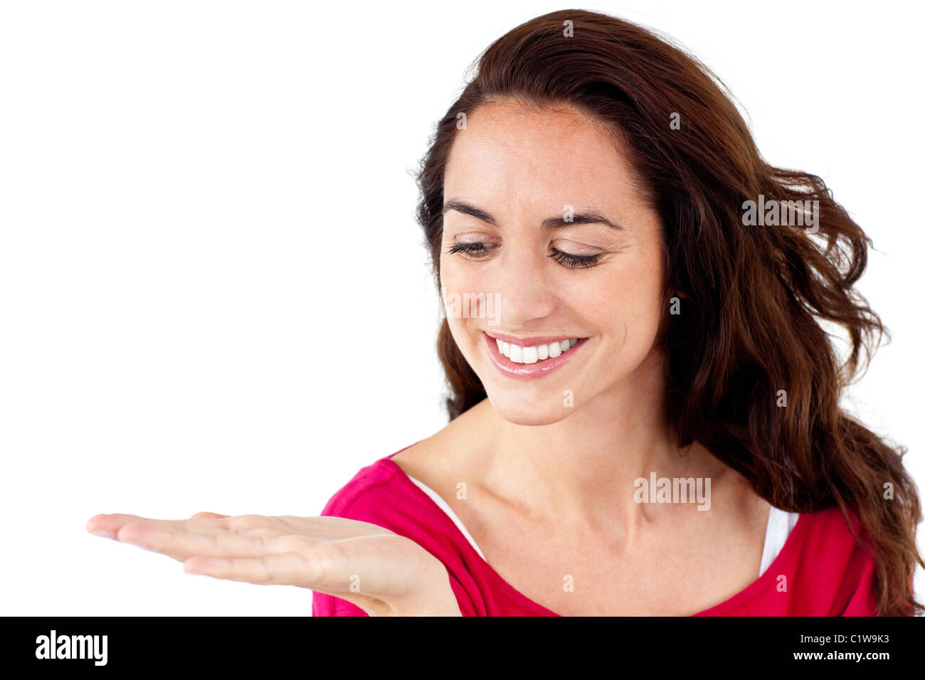 Smiling woman presenting Stock Photo - Alamy