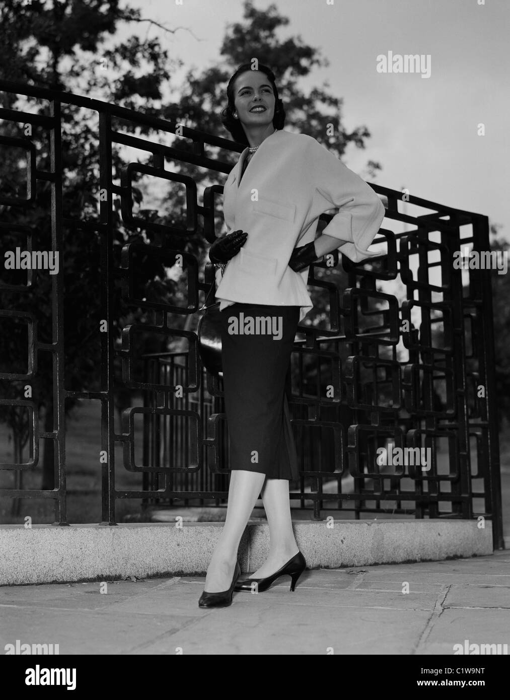 Posing outdoors in Black and White Stock Photos & Images - Alamy